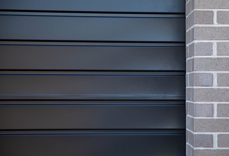 Why You Should Consider a Smart Roller Door | C&M Garage Doors